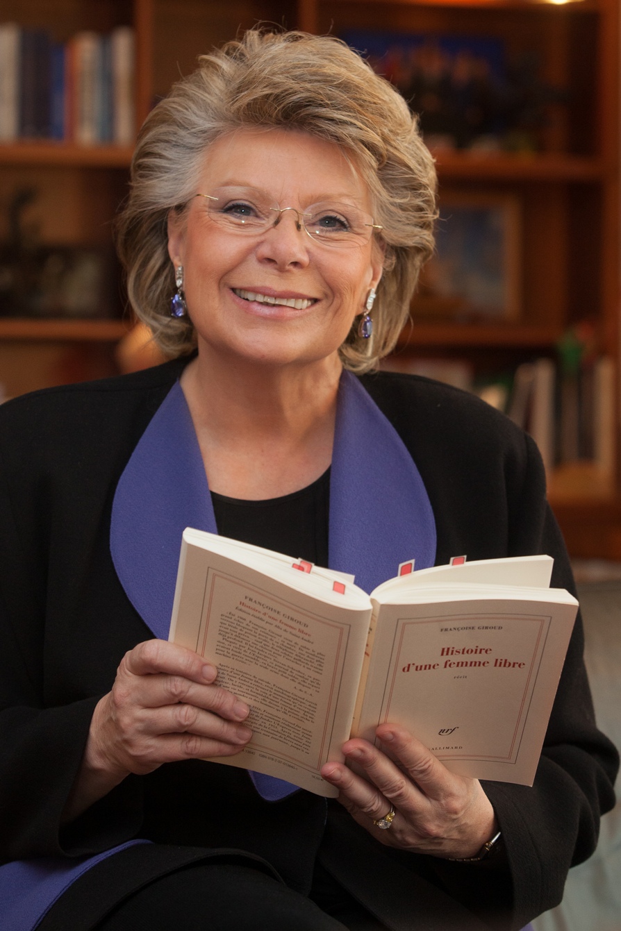 A big library is a must and books are piled up all around my home, says ...